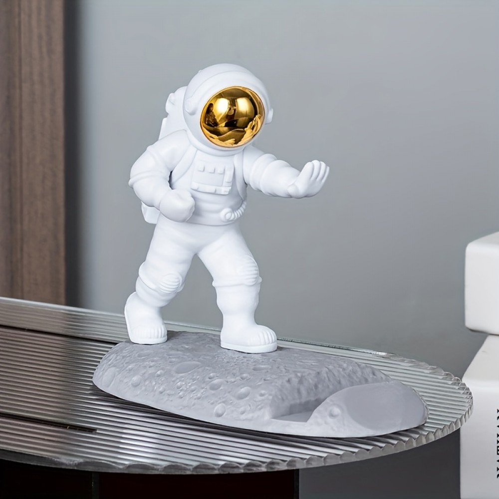 Spice Up Your Desk with this Astronaut-Themed Phone Holder - Perfect ...